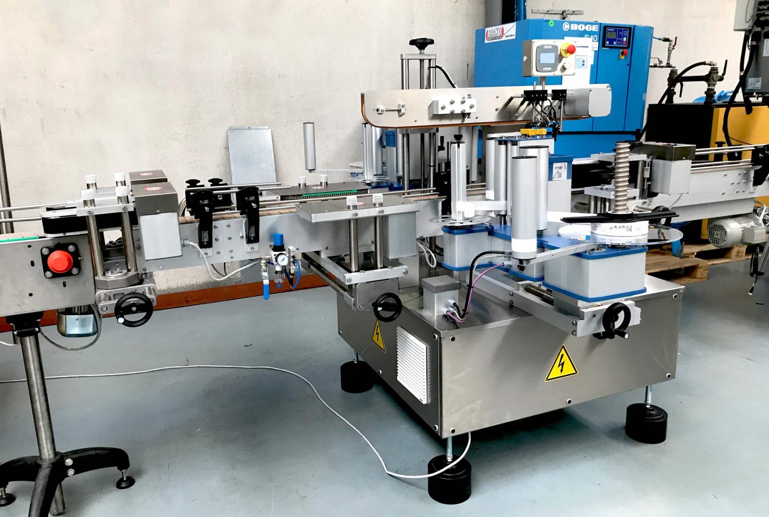 Customized Labelling system for cylindrical products · Etipack.it